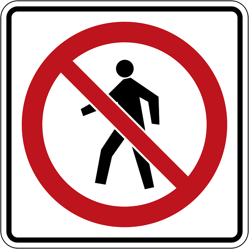 No Jaywalking Sign