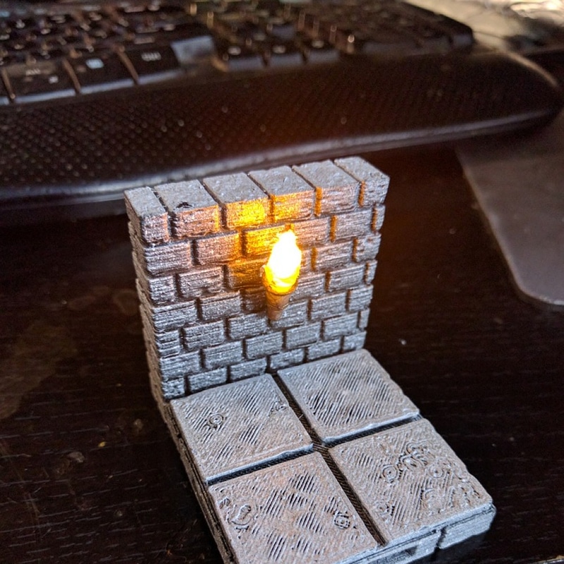 Cut-Stone Torch Wall - Free 3d model on creazilla.com